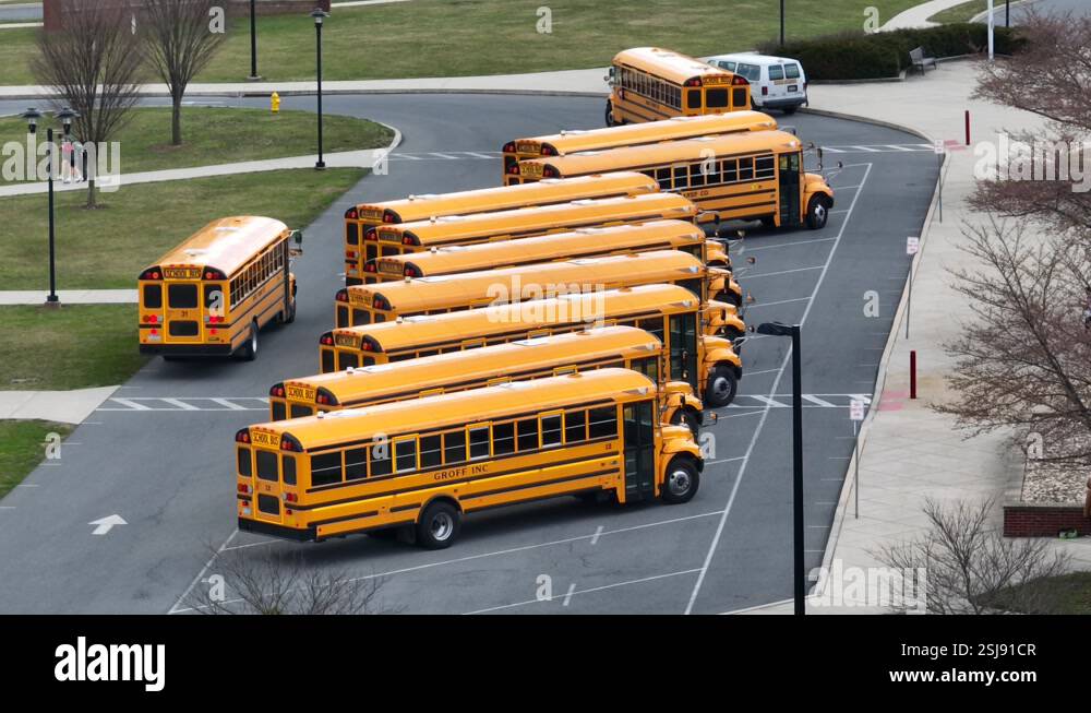 Line up of many school bus vehicles to transport students from public ...