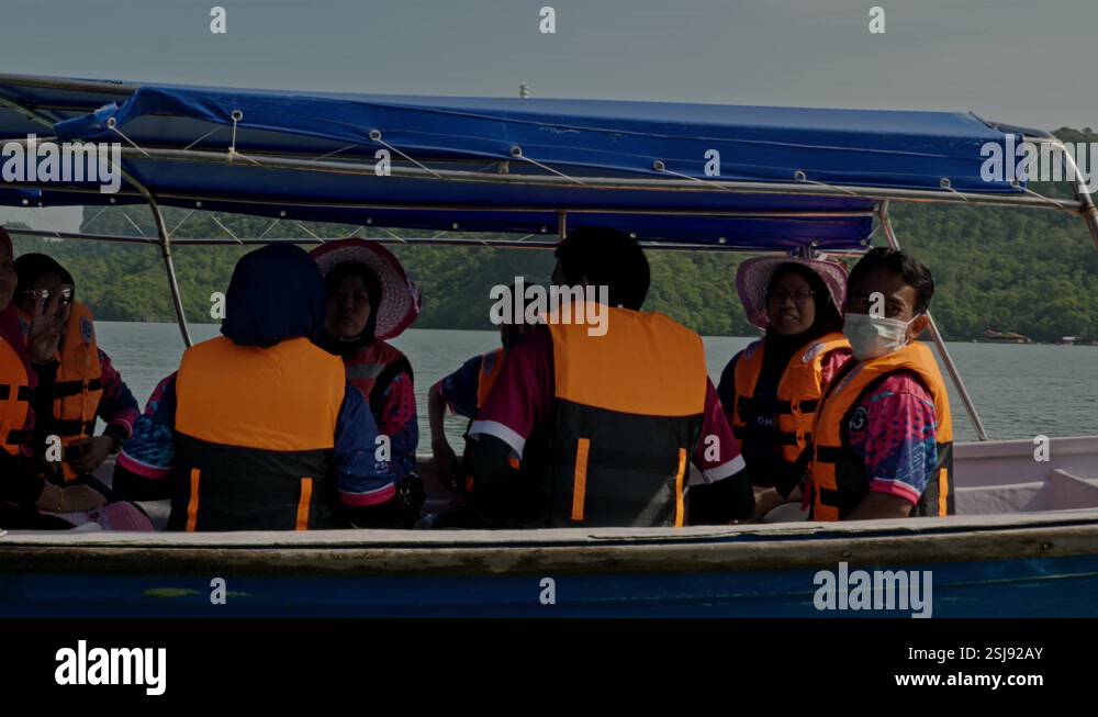 Tour boats full of tourists a river of the Kilim Geoforest Park in ...