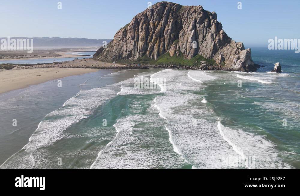 Magical sight of Morro Bay. Triangle rock at the shore of Central coast ...