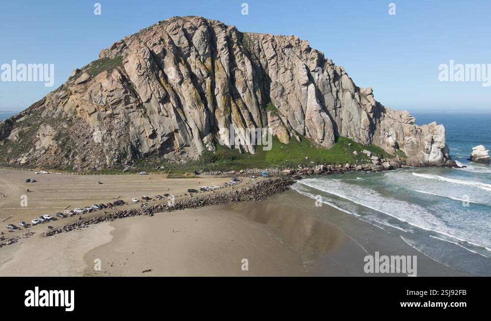 Magical sight of Morro Bay. Triangle rock at the shore of Central coast ...