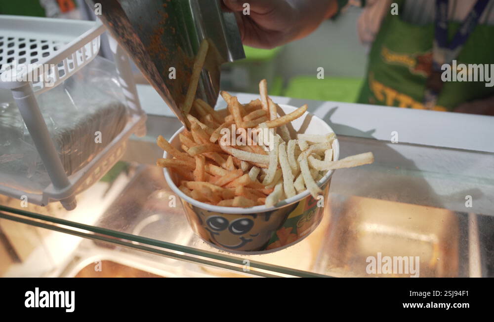 French Fries With A Variety Of Flavor In A Food Stall. Close Up Stock ...