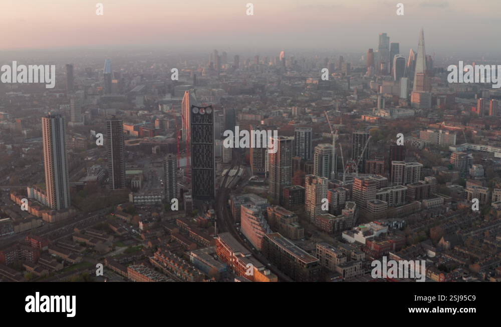 Dolly forward aerial shot towards Elephant and Castle Train station at ...