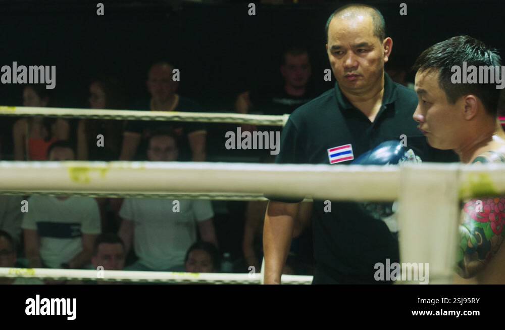 4K Cinematic slow motion footage of two Thai fighters fighting on a ...
