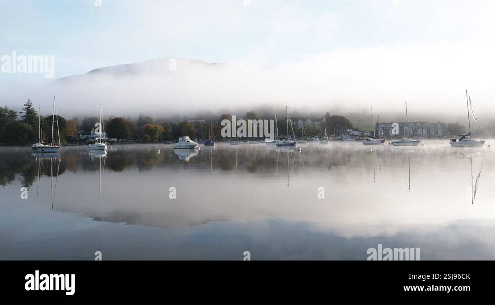 Autumn mist on Lake Windermere, Ambleside, Lake District, UK with ...