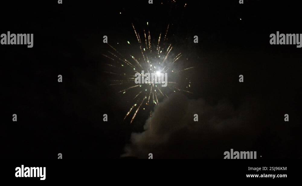 A firework display over woodland in Ambleside, Lake District, UK Stock ...