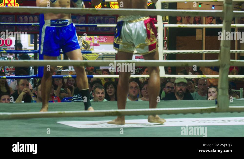 4K Cinematic slow motion footage of two Thai fighters fighting on a ...