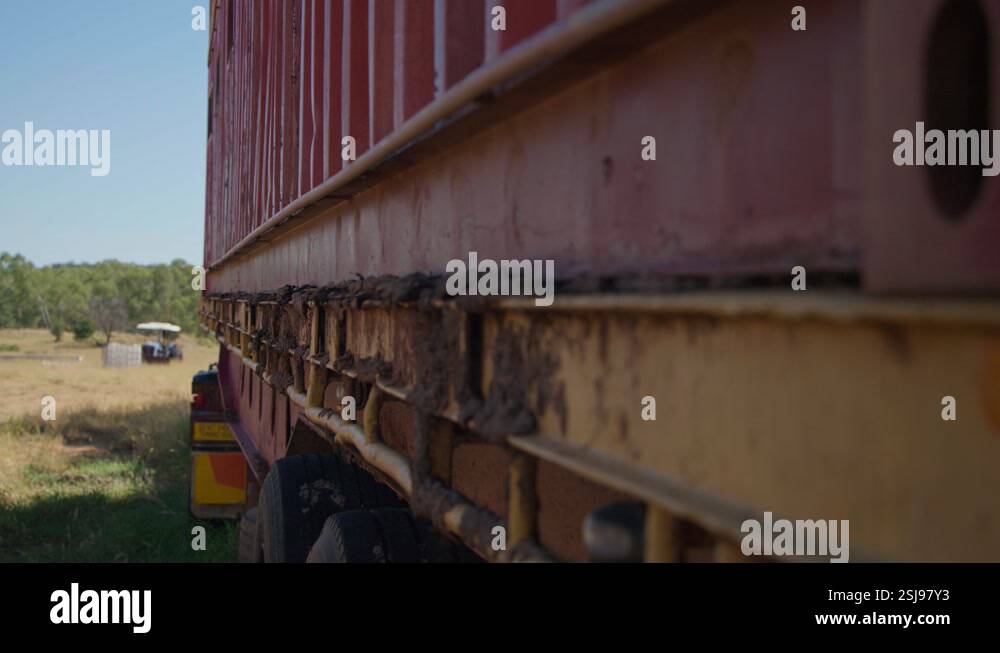 Handheld, Side of a dirty Cattle truck on a remote farm in Australia ...