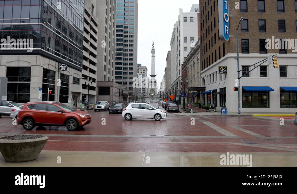Downtown, Indianapolis Indiana with traffic at an intersection with ...