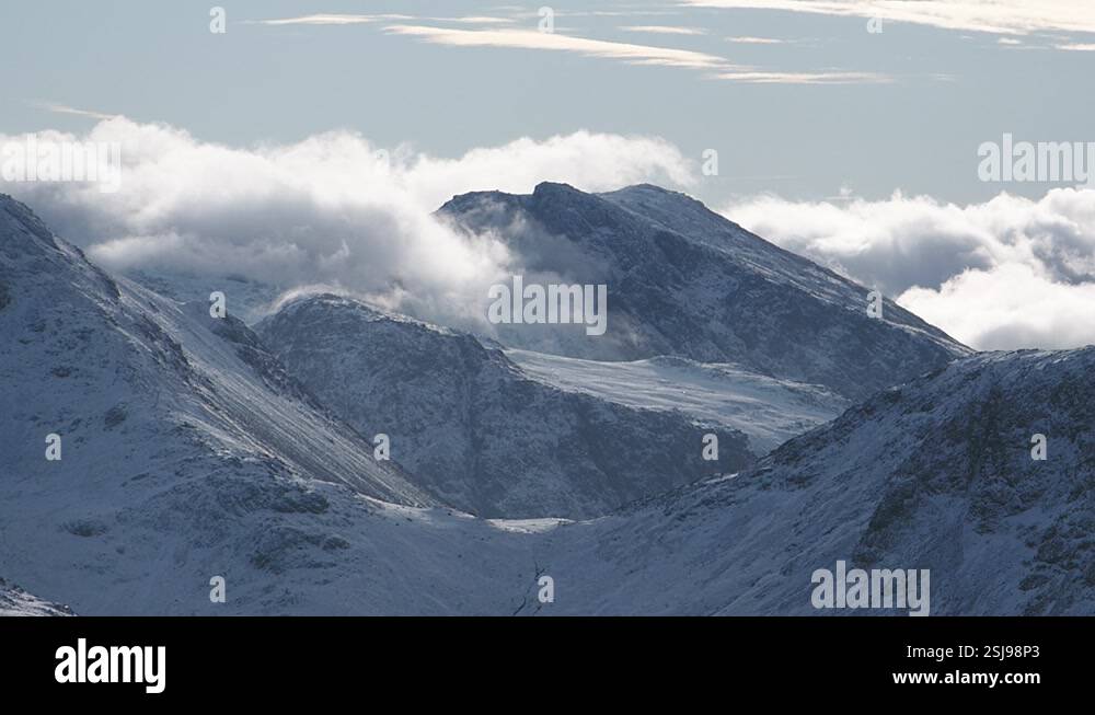 Cloud spilling over Great Gable and the Scafell range from Hindscarth ...