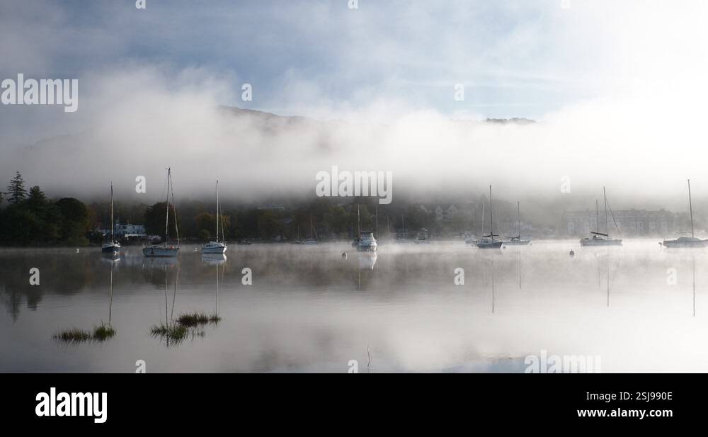 Autumn mist on Lake Windermere, Ambleside, Lake District, UK with ...