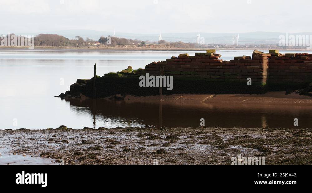 Remains of the old wharf at Port Carlisle on the Solway estuary in ...