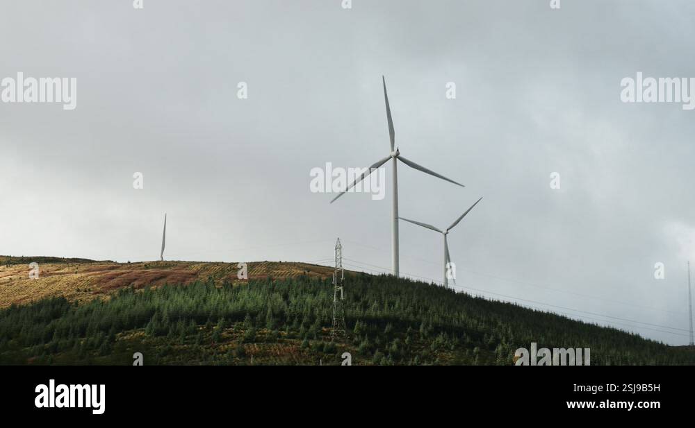 Wind turbines at the side of the M74 in the Southern Uplands, Scotland ...