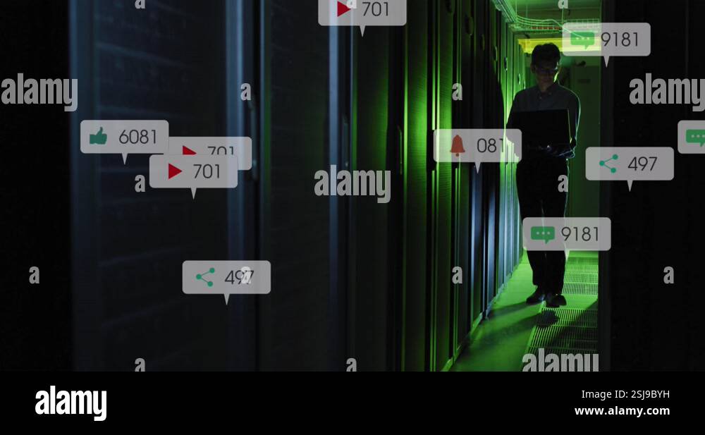 Animation of social media icons over asian male engineer using laptop ...