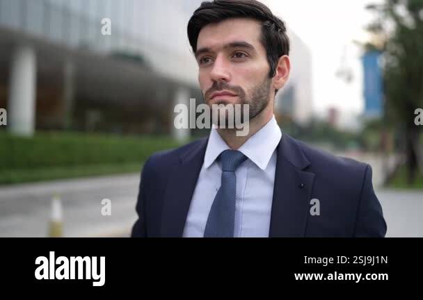 Closeup of business man walking near camera at city view. Project ...