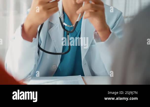 Patient attend doctors appointment at clinic or hospital office. Doctor examining and diagnosis ...