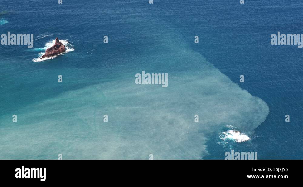 Fresh river water mixing with the Atlantic Ocean in Arco de Sao Jorge ...