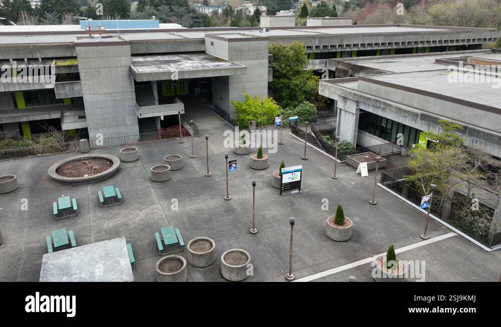 Aerial view pulling away from an empty courtyard at North Seattle ...