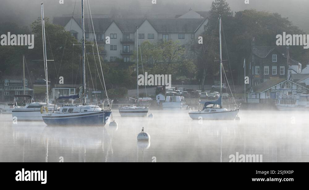 Autumn mist on Lake Windermere, Ambleside, Lake District, UK with ...