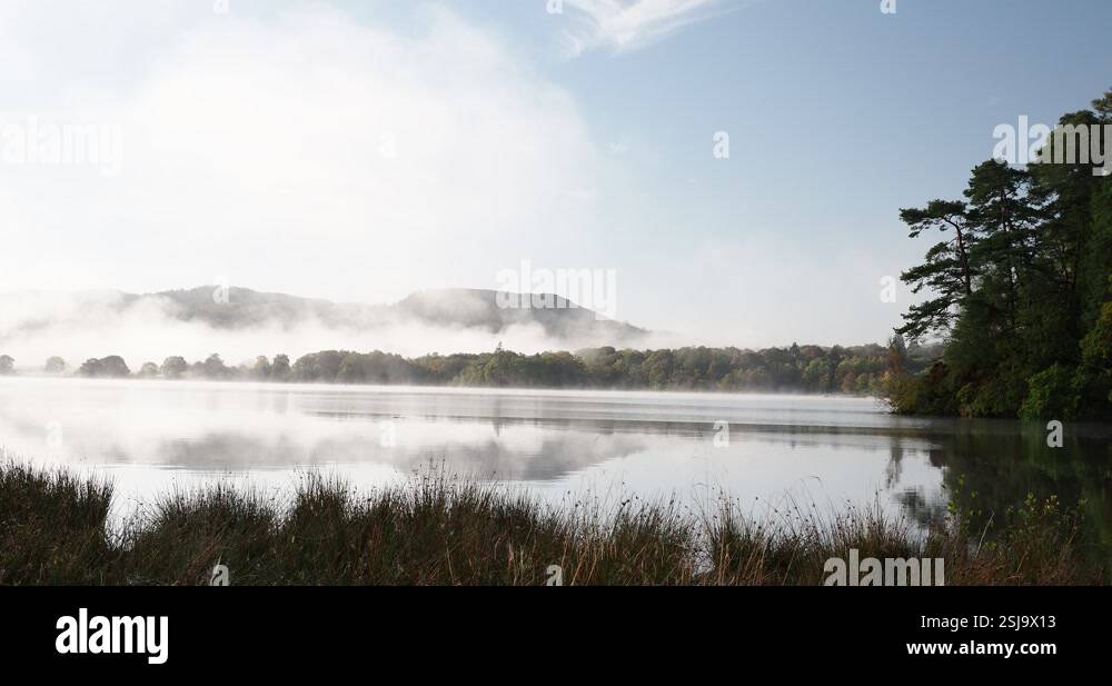 Autumn mist on Lake Windermere, Ambleside, Lake District, UK with ...