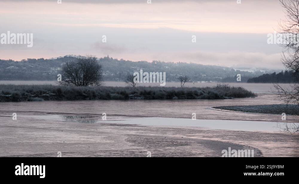 The River Brathay at the head of Lake Windermere frozen after days of ...