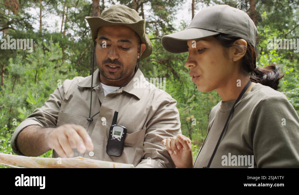 Diverse Rangers Planning Land Demarcation Work in Forest Stock Video ...