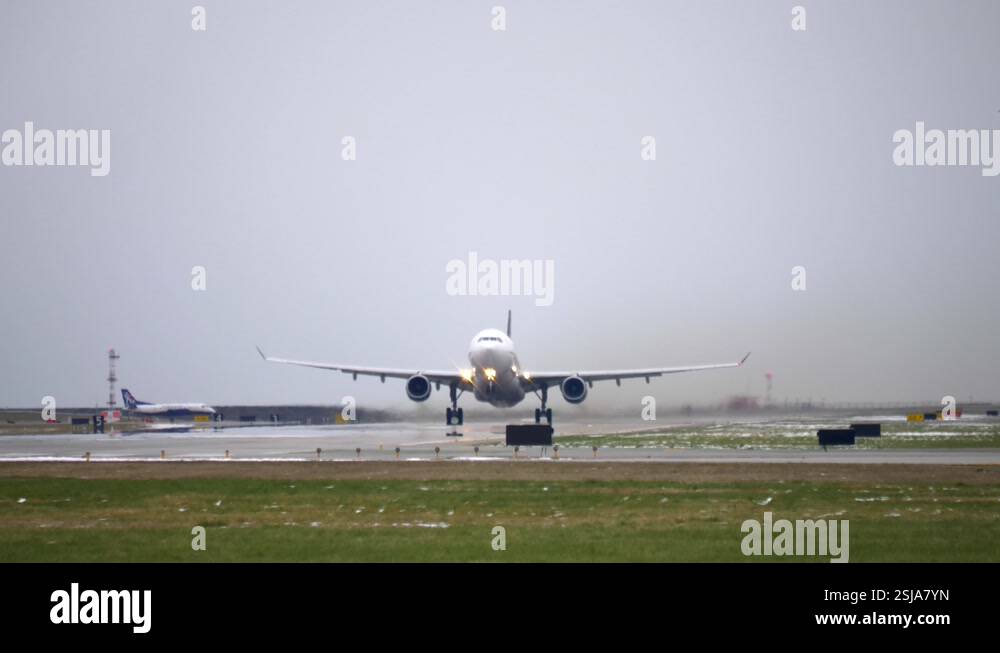 Airbus A330 Takeoff From the Runway, Cloudy Day, Low Angle Belly View ...