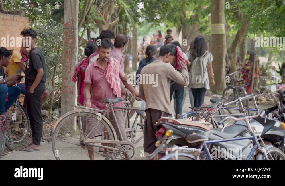 Poor Indian people taking back their cycles from parking and returning ...
