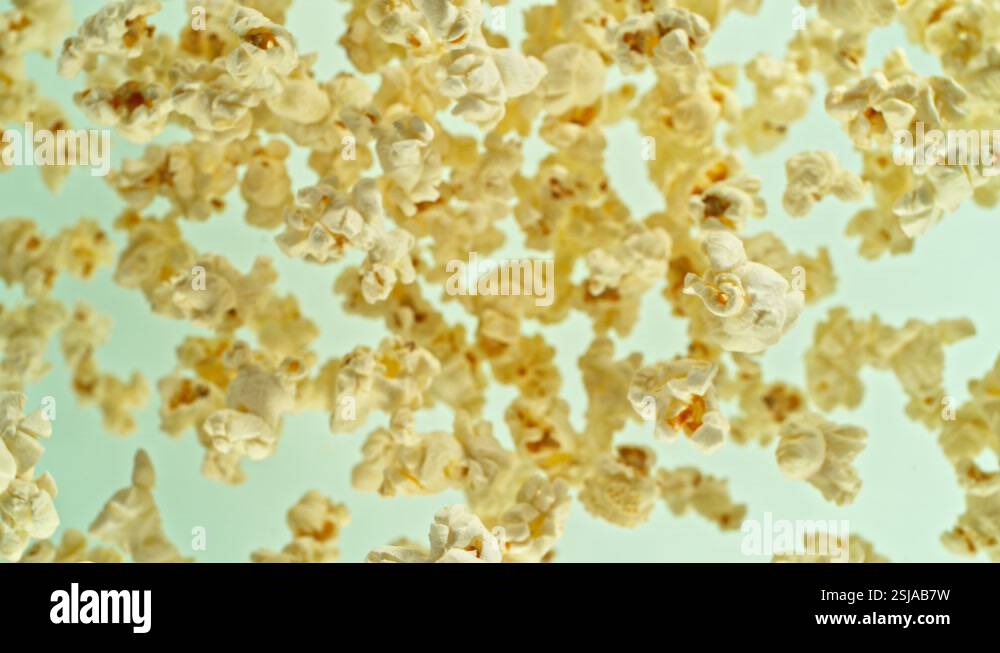 Super slow motion of rotating popcorn in the air Stock Video Footage ...