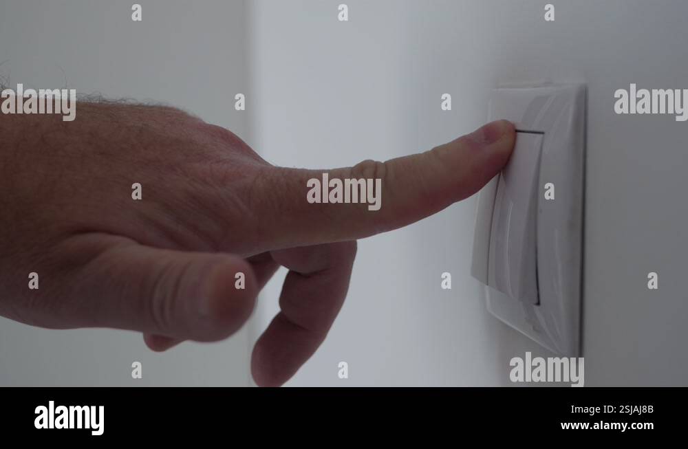 Shooting with a Hand Pushing the Switch and Shutting Down the Light in ...