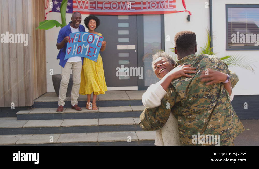 Multi-Generation Family With Parents And Wife Welcoming Army Soldier ...