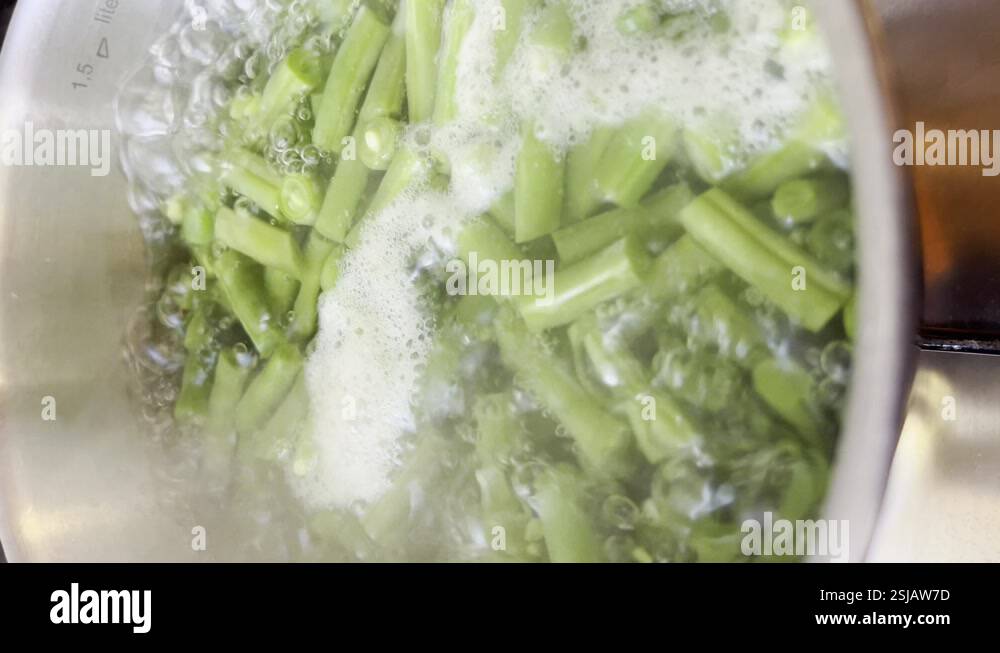 Vertical View Of Boiling Green Beans Vegetables Over Stove. Close Up ...