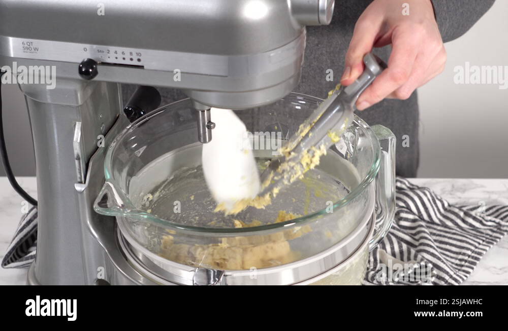 Step by step. Mixing ingredients in kitchen mixer to bake homemade ...