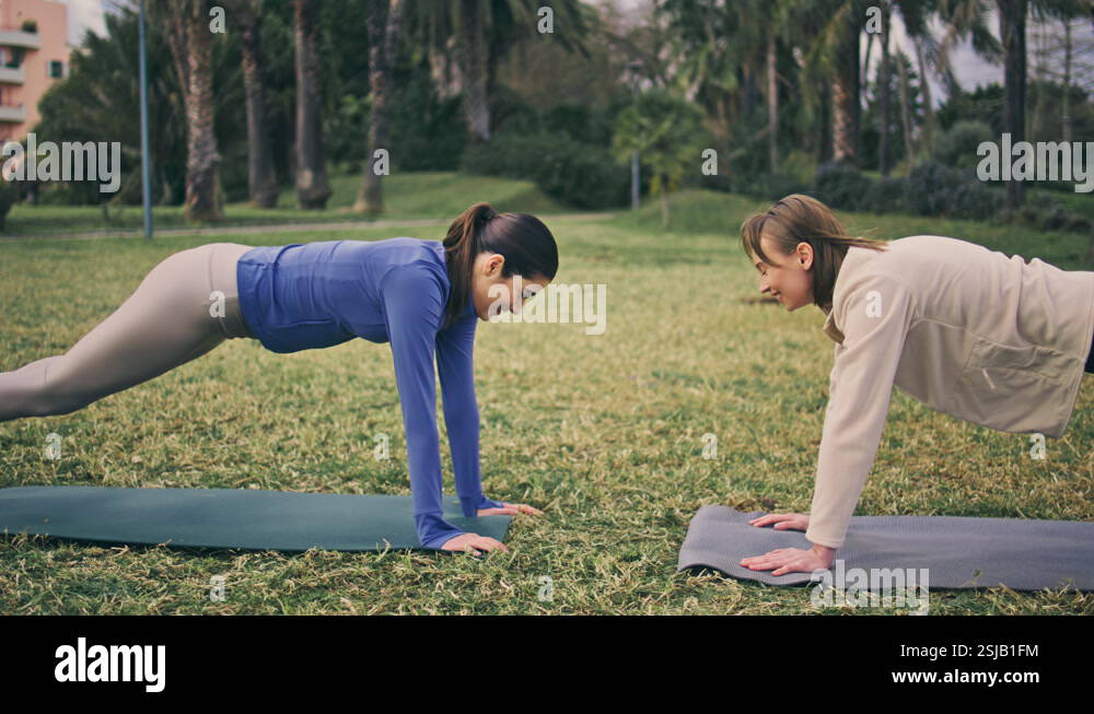 Active ladies sport workout summer park. Athlete girls clapping hands ...