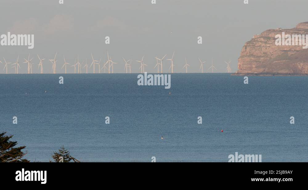 An offshore wind farm off the North Wales coast with Great Orme, from ...
