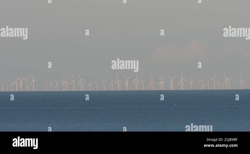 An offshore wind farm off the North Wales coast from Anglesey, Wales ...