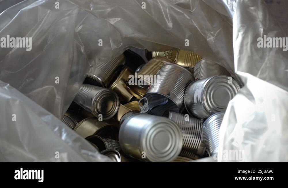 Sorted tin cans. Waste sorting centre. Metal recycling Stock Video ...