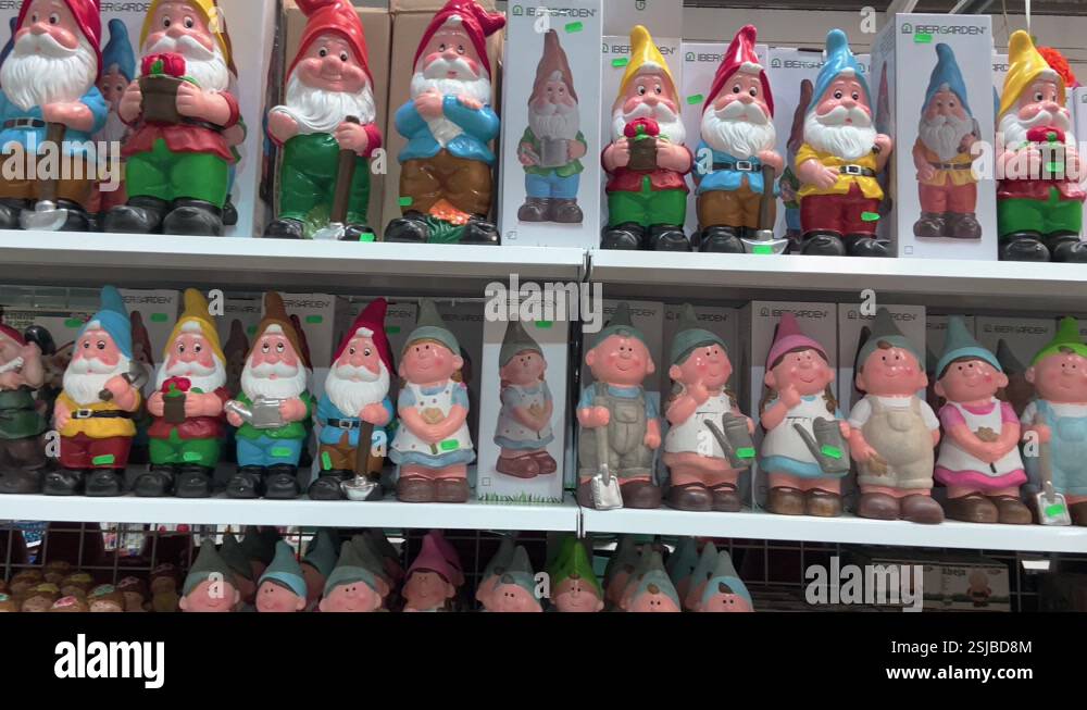 Assorted coloured garden gnomes on shop shelve Stock Video Footage - Alamy