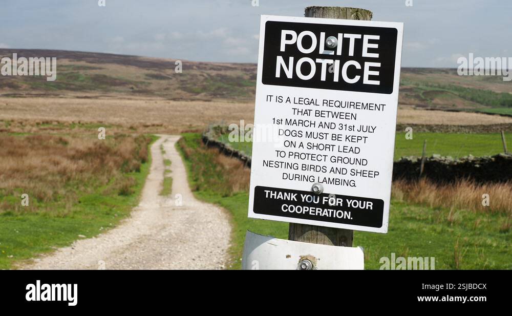A sign on the moors above Ilkley, Yorkshire, UK, requesting dog owners ...