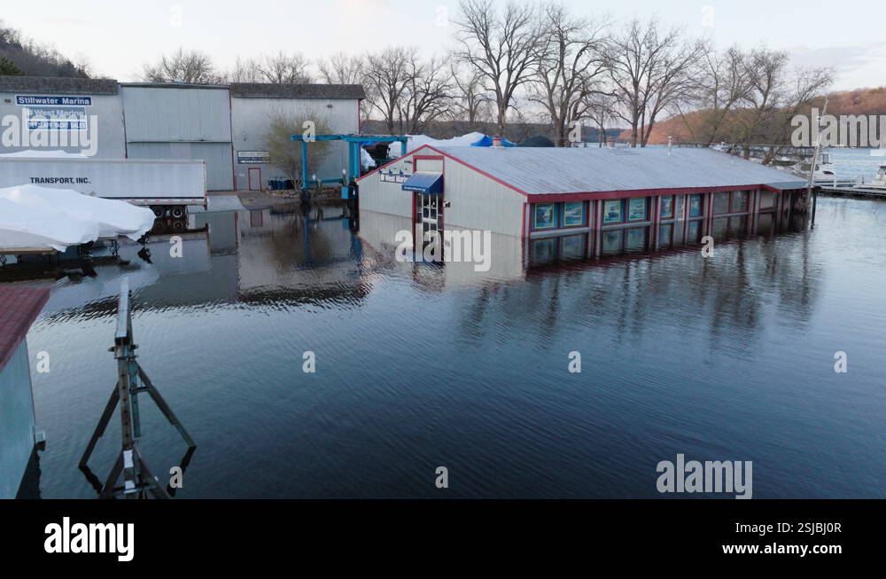 Natural flooding disaster at boat club with marina submerged underwater ...