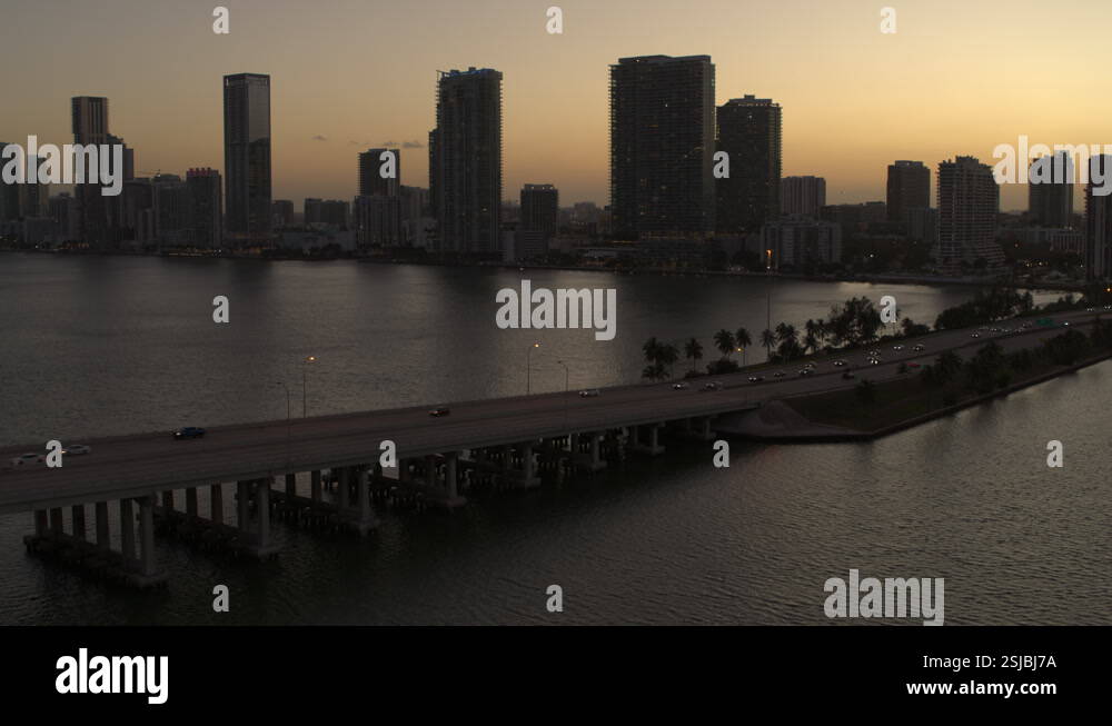 Miami Bridge with cars passing by With Downtown Miami In The Background ...