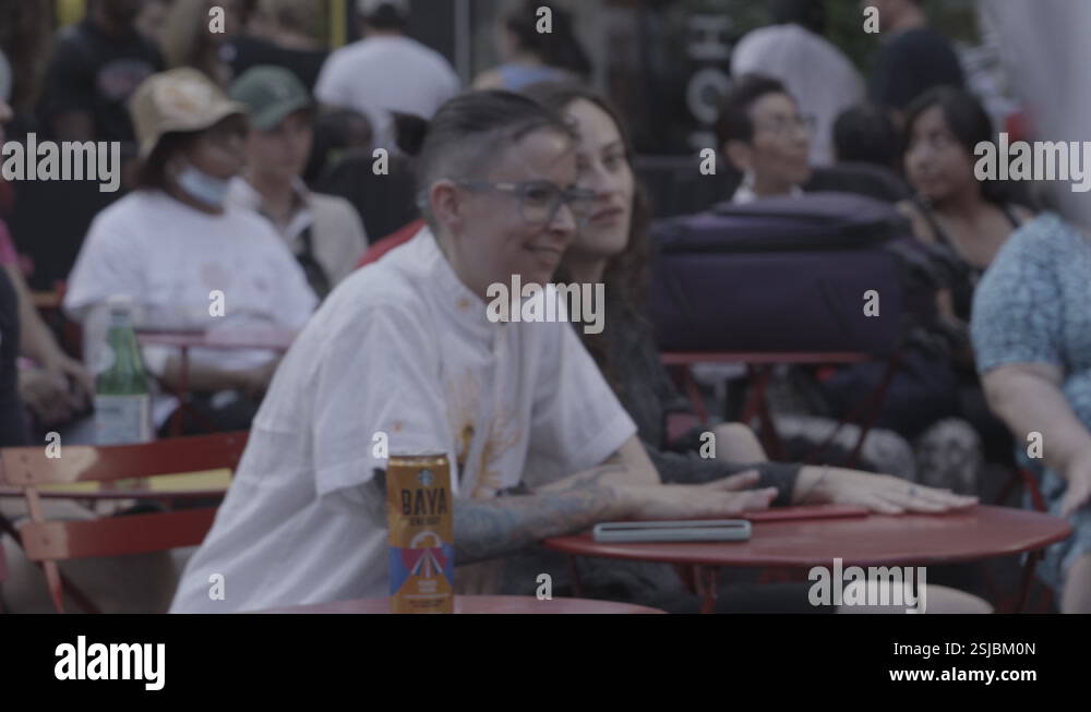 People, handsome man, laughing woman, cute crowd enjoying and jamming ...