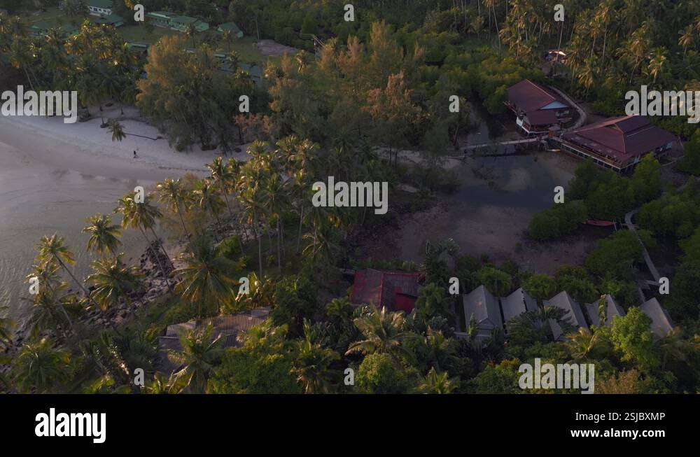 Flyover mountain with jungle to the resort Dramatic aerial top view ...