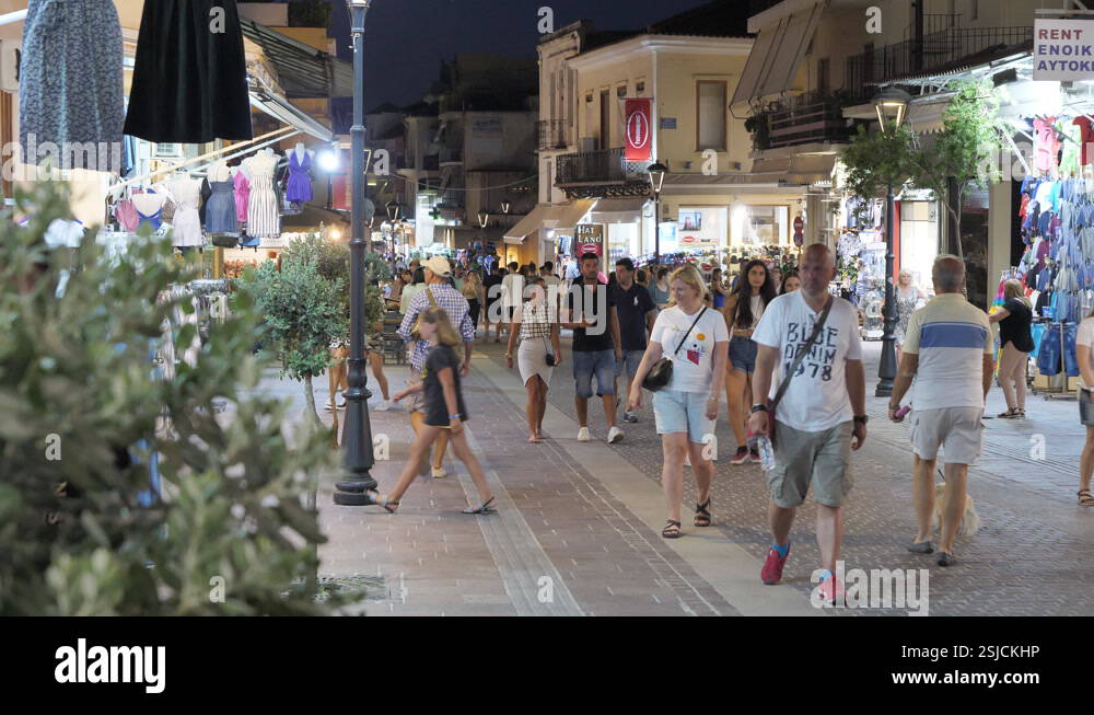 Crowd Of People On Bustling Market Street At Night In Chania, Crete ...