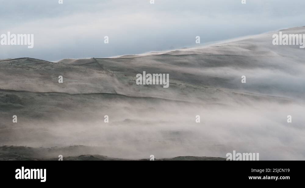 Valley mist from a temperature inversion at dawn on Wansfell, Ambleside ...