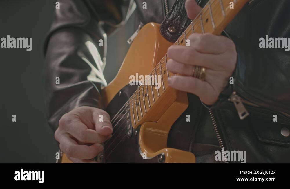 Hands of Musician Playing Electric Guitar Stock Video Footage - Alamy