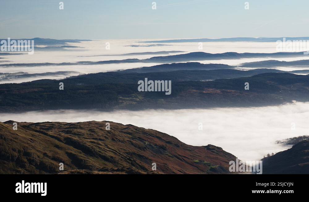 Looking over Coniston Water from Swirl Howe with mist from a ...