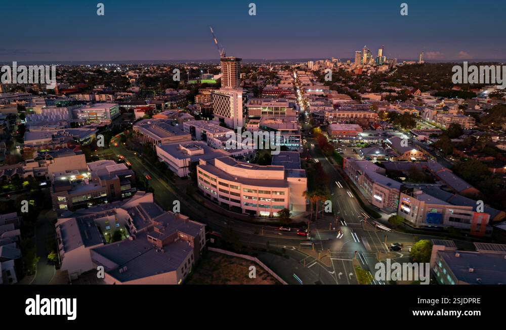 Drone time lapse hyper lapse descending into Subiaco at Twilight Stock ...