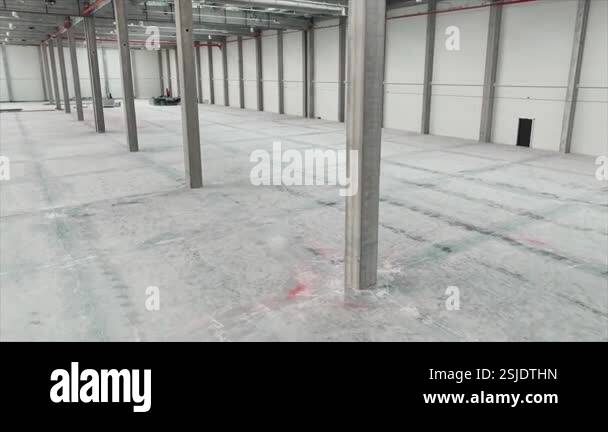 Drone footage of modern storage interior. Empty industrial space with ...