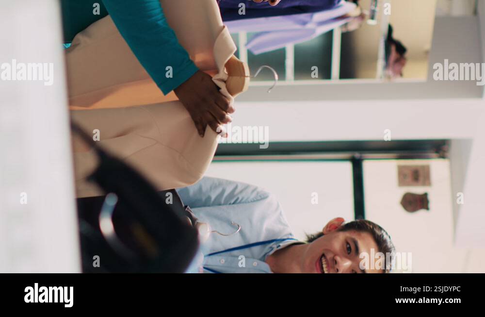 Customers asking for employee help Stock Video Footage - Alamy