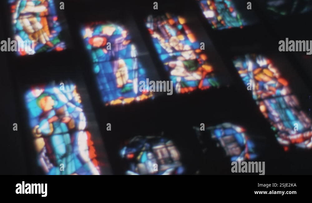 Stained glass windows with images of saints in the Cathedral of Mary ...